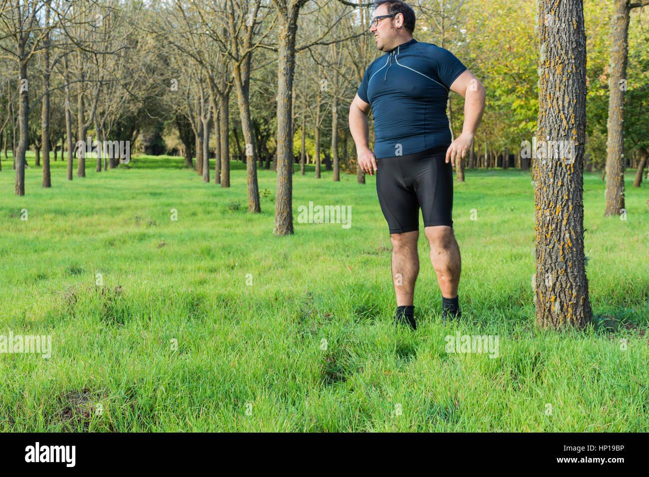 Abstract and conceptual tired, tired man in the woods. Man weighed down ...