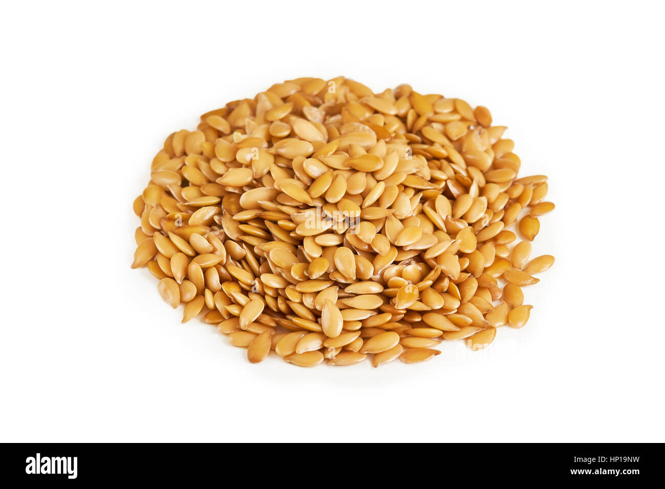 Pile of golden sesame seeds isolated on white background Stock Photo ...