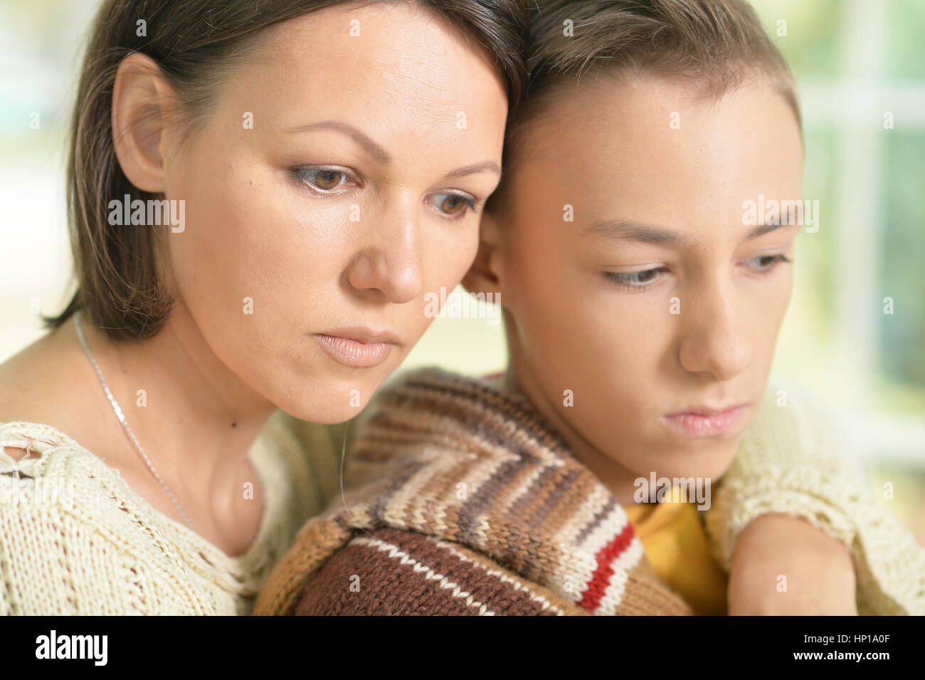sad mother and son Stock Photo - Alamy