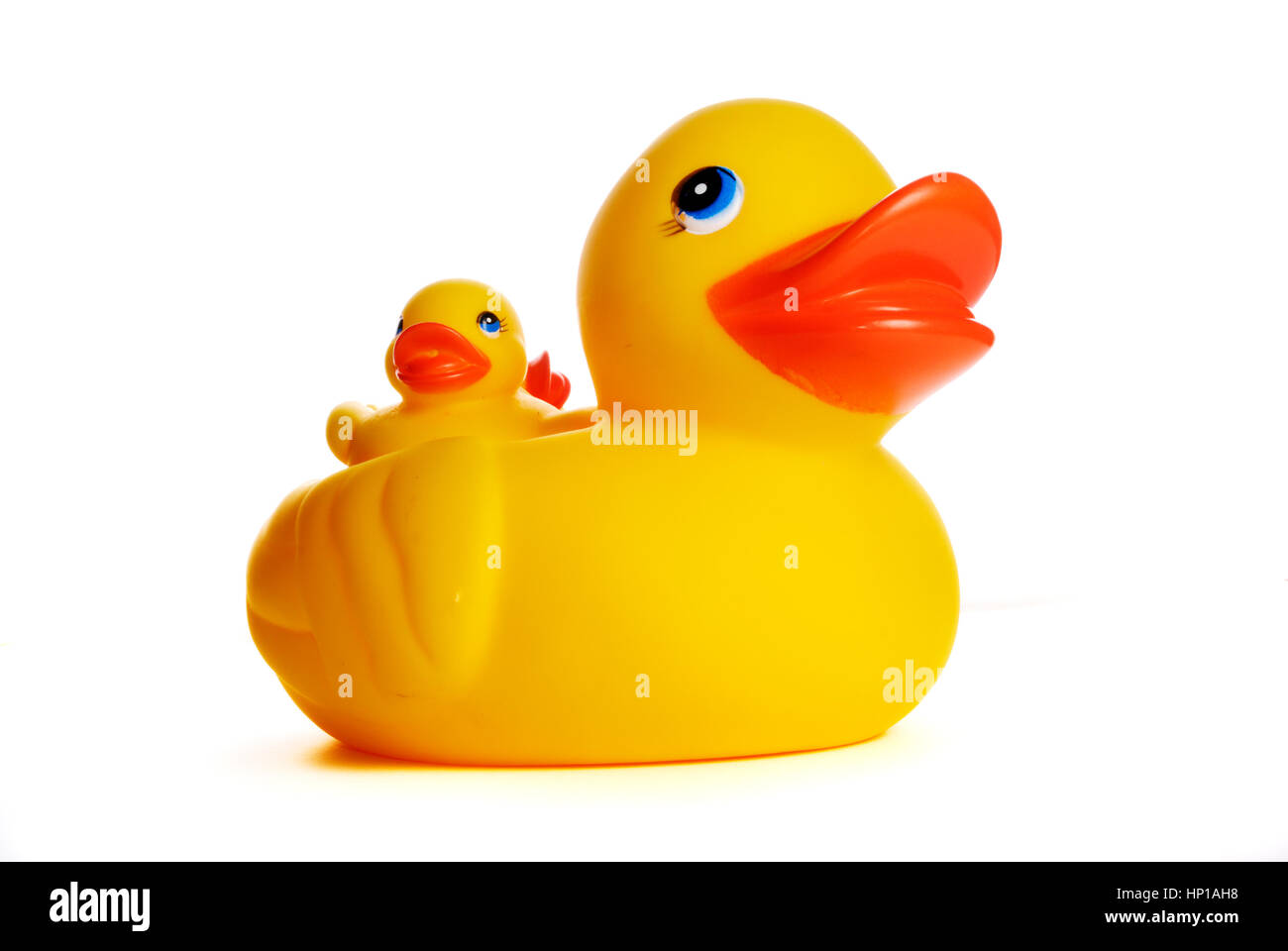 yellow rubber toys ducks isolated Stock Photo - Alamy