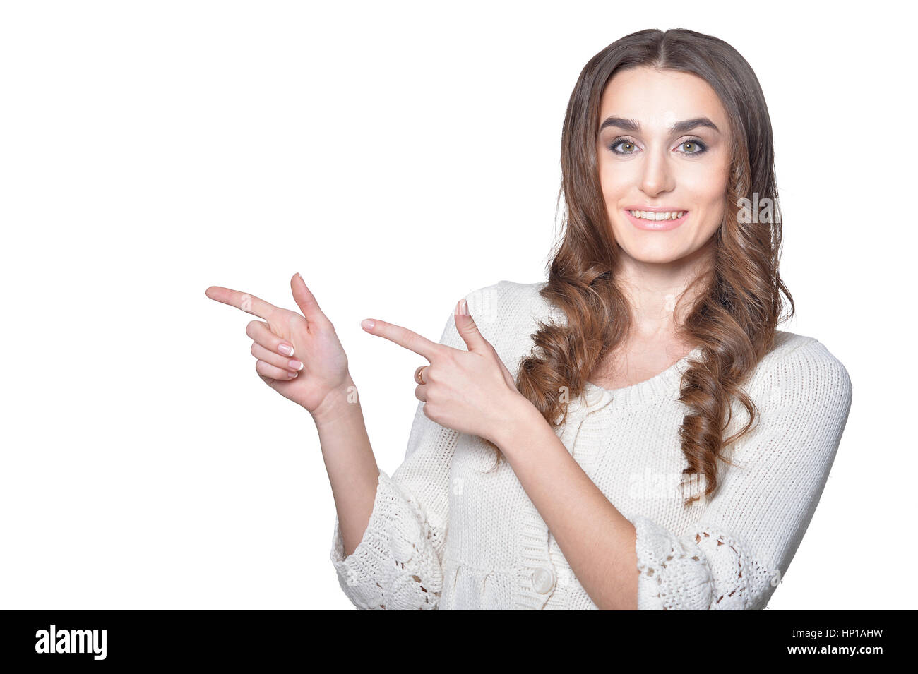 young woman pointing Stock Photo - Alamy