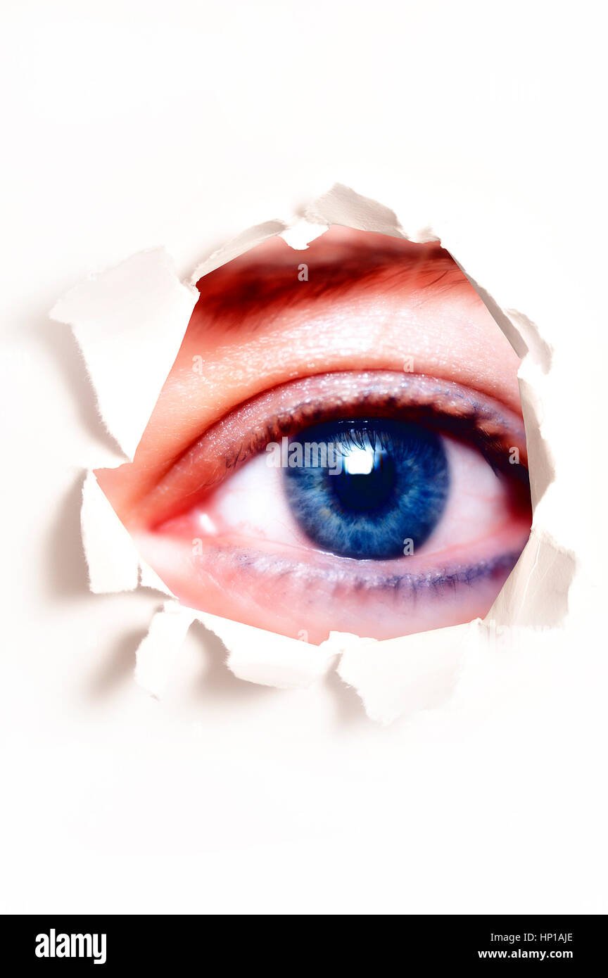 female blue eye behind a hole in a teared white paper Stock Photo - Alamy