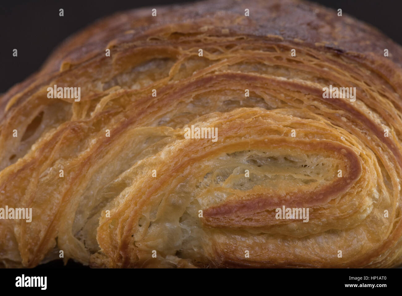 Layers of Croissant Pastry rolled up shows texture of the breakfast ...