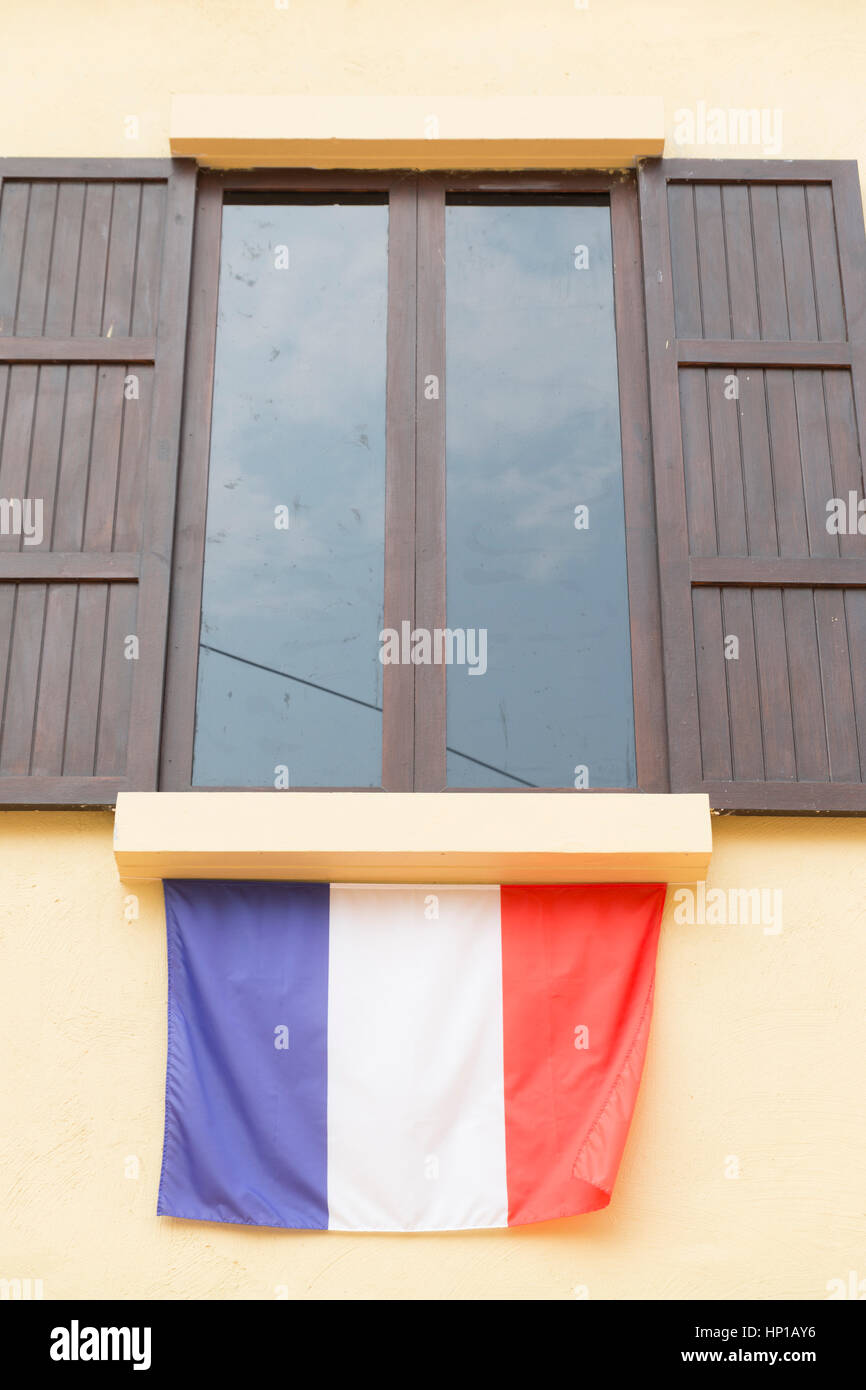 brown wooden window with tinted glass decorating with france national ...