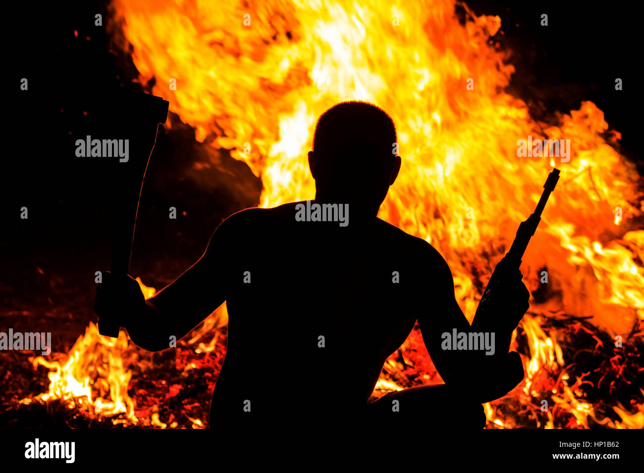 activist with a gun and hatchet,conflict, war, enmity, strife, war for ...
