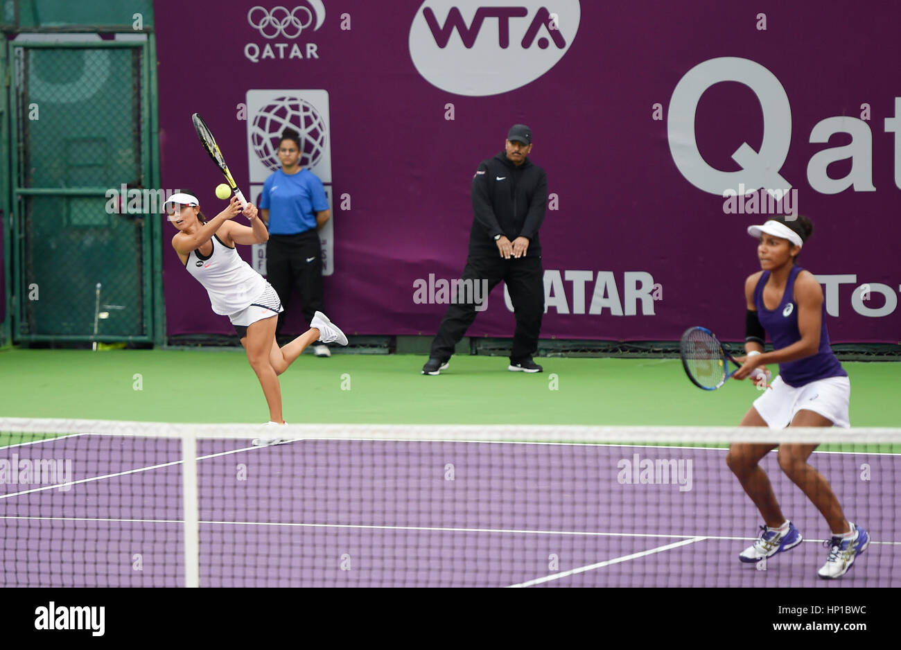 Doha, Qatar. 16th Feb, 2017. Xu Yifan (L) of China and Raquel Atawo of ...