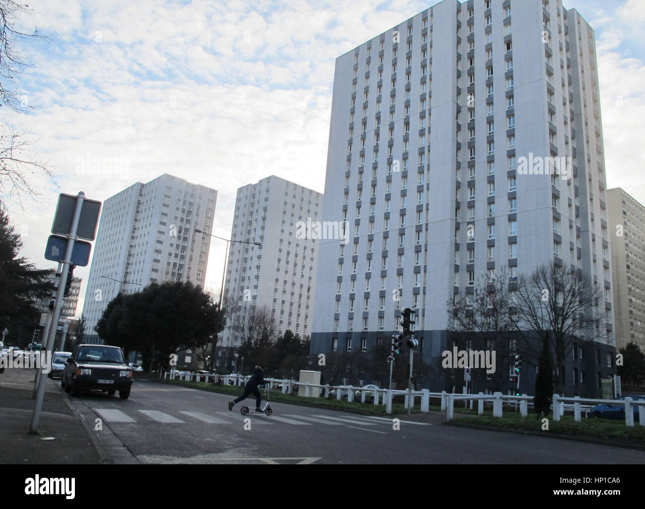 Bobigny, France. 14th Feb, 2017. A child rides a scooter across the ...
