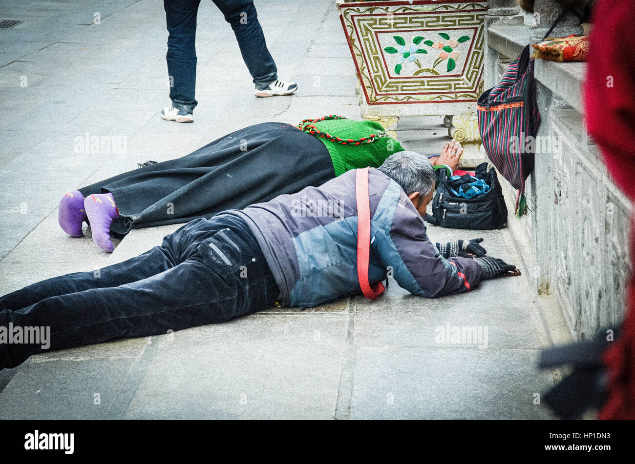 Tibet, Tibet, China. 17th Feb, 2017. Pious Buddhist pilgrims on their ...