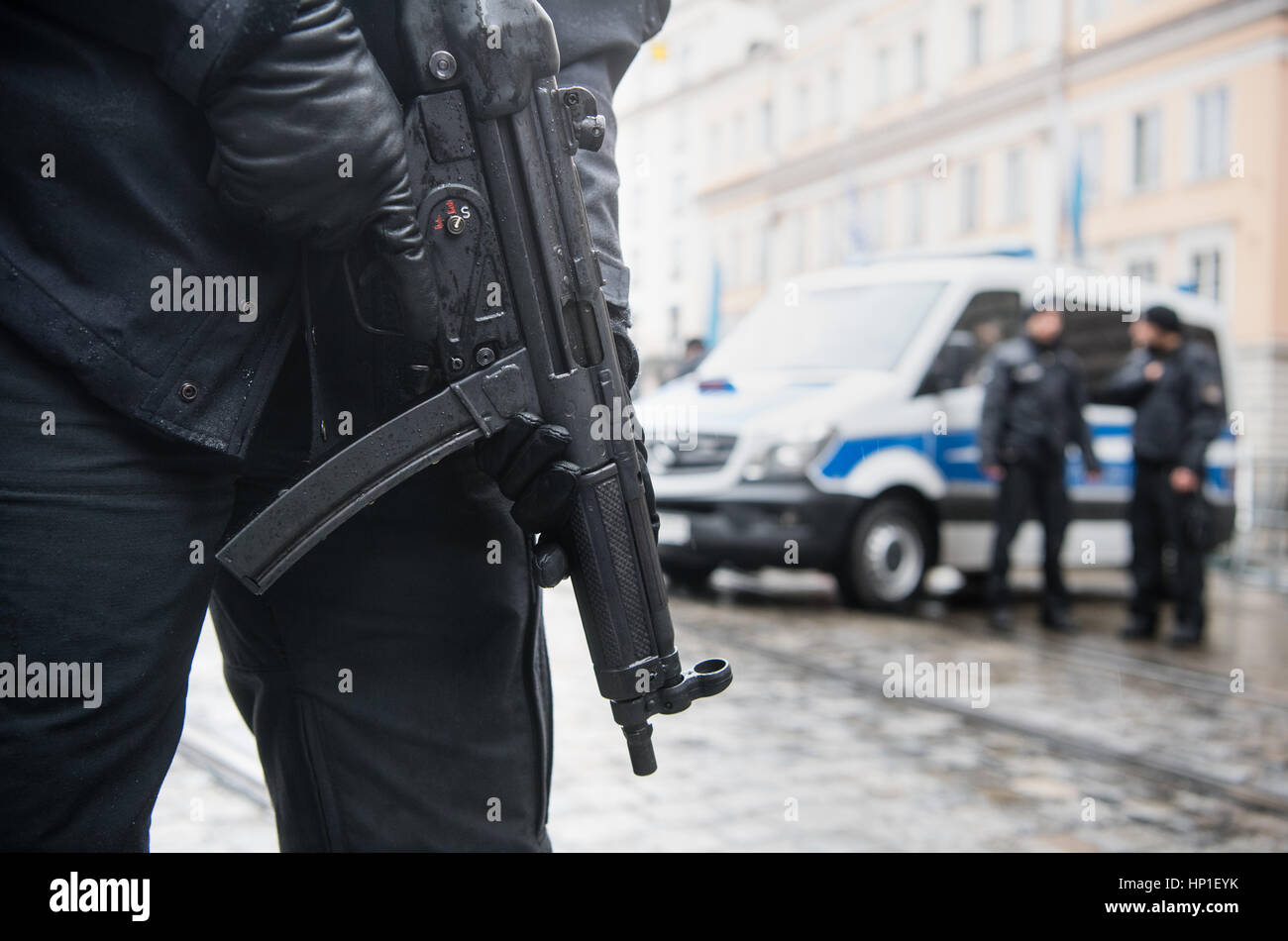 Munich, Germany. 17th Feb, 2017. A police officer with a Heckler & Koch ...