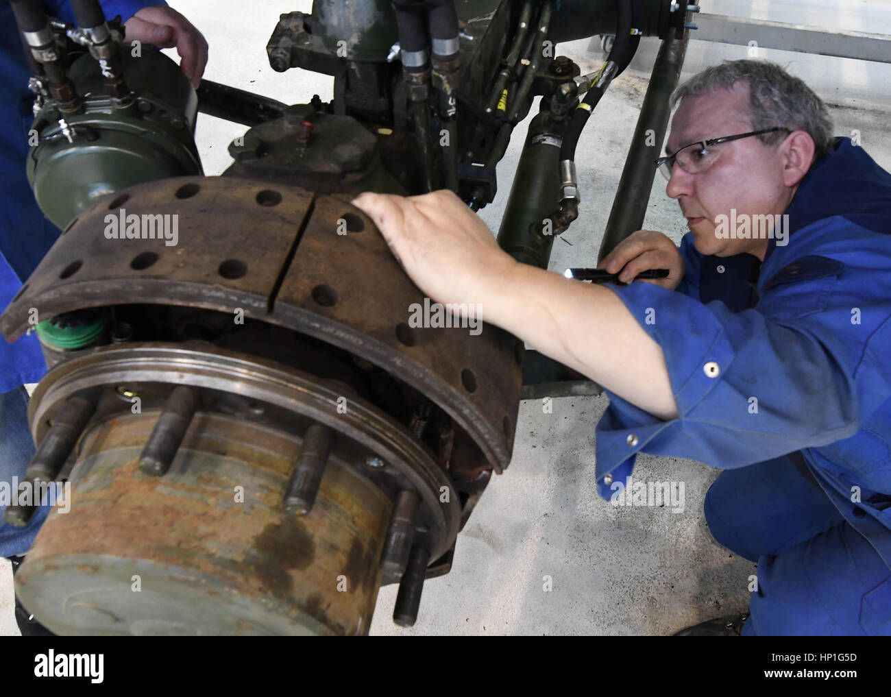 Doberlug-Kirchhain, Germany. 16th Feb, 2017. An employee of the ...