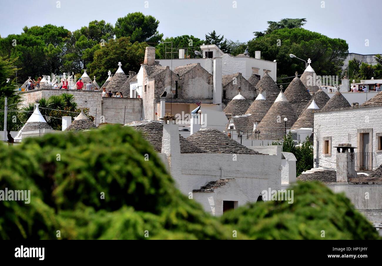 Tourists visit the city of Alberobello (Italy) on 17 August 2016, which ...