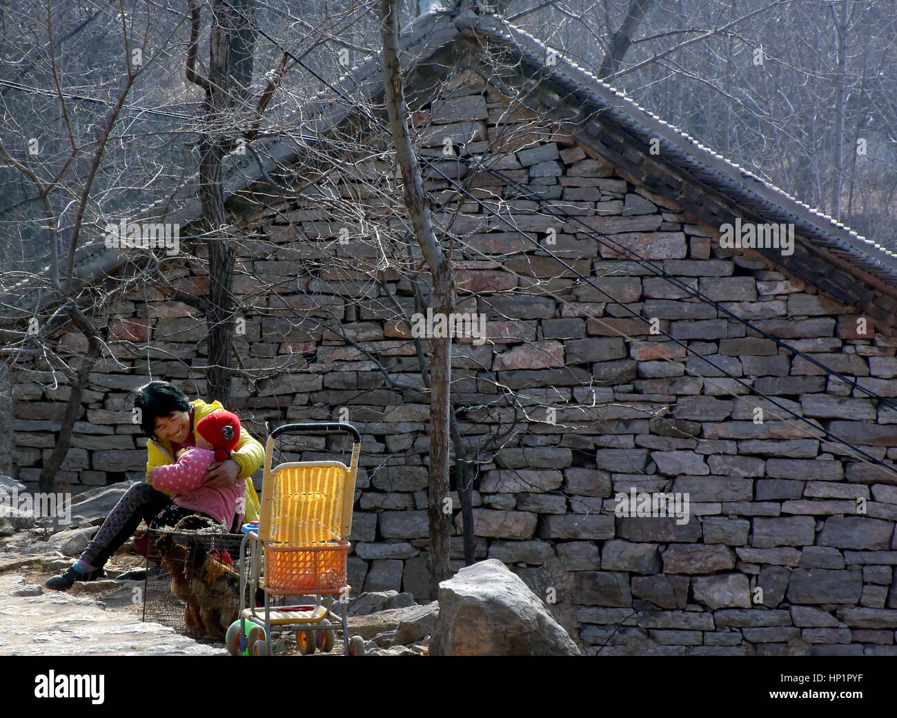 Zhengzhou, China's Henan Province. 15th Feb, 2017. A villager plays ...