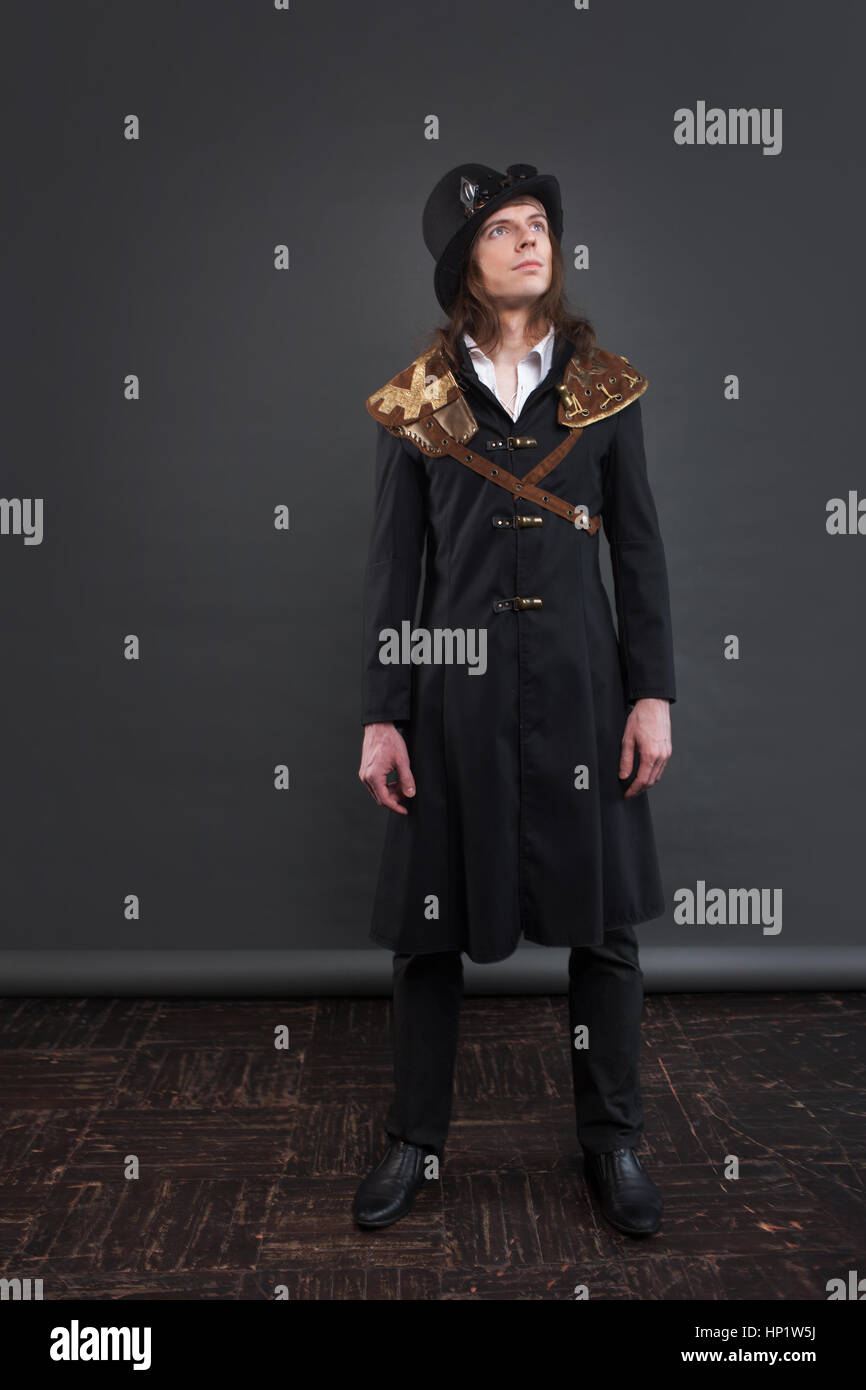 Handsome male Steam punk. Retro man portrait over grunge background ...