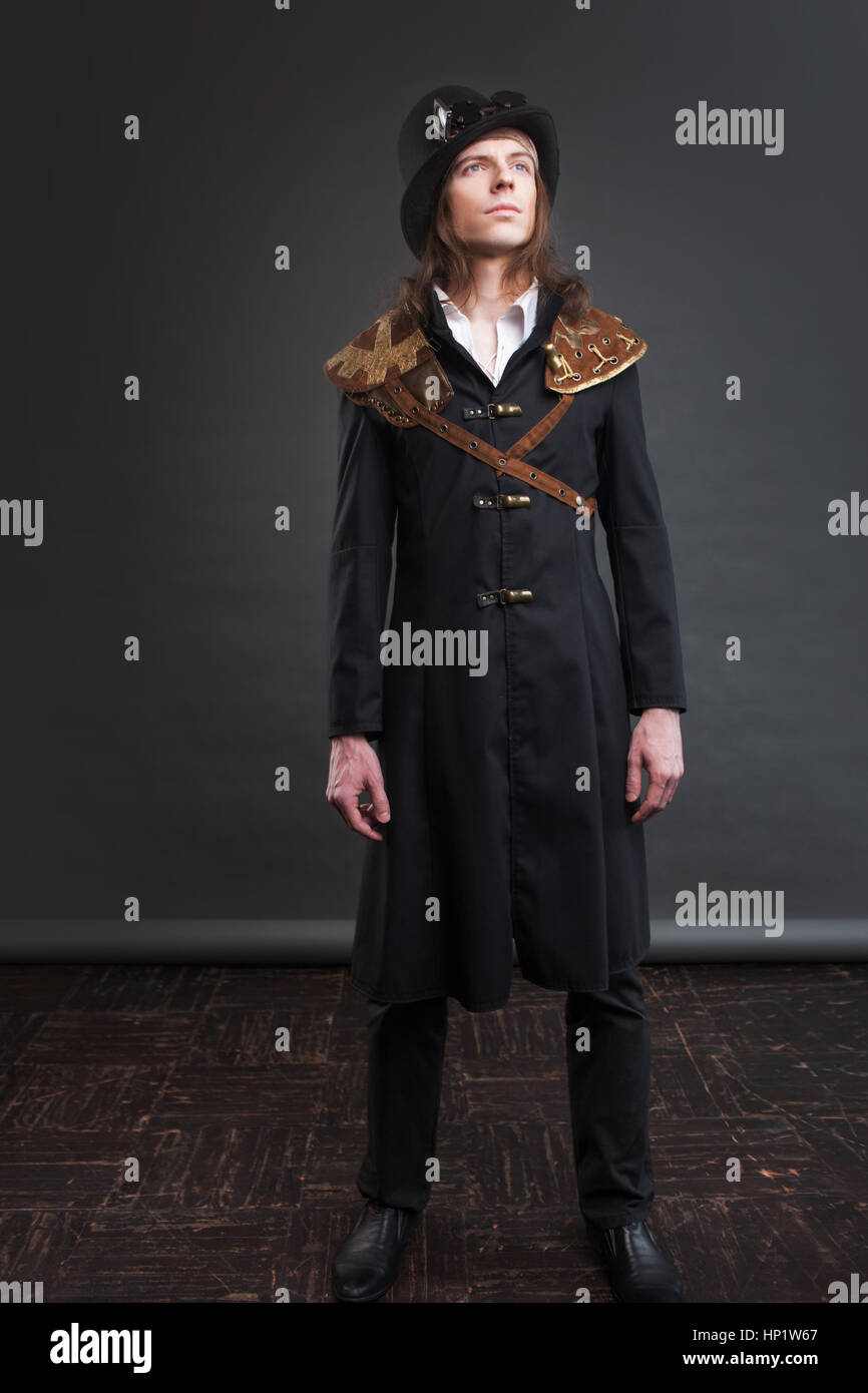 Handsome male Steam punk. Retro man portrait over grunge background ...