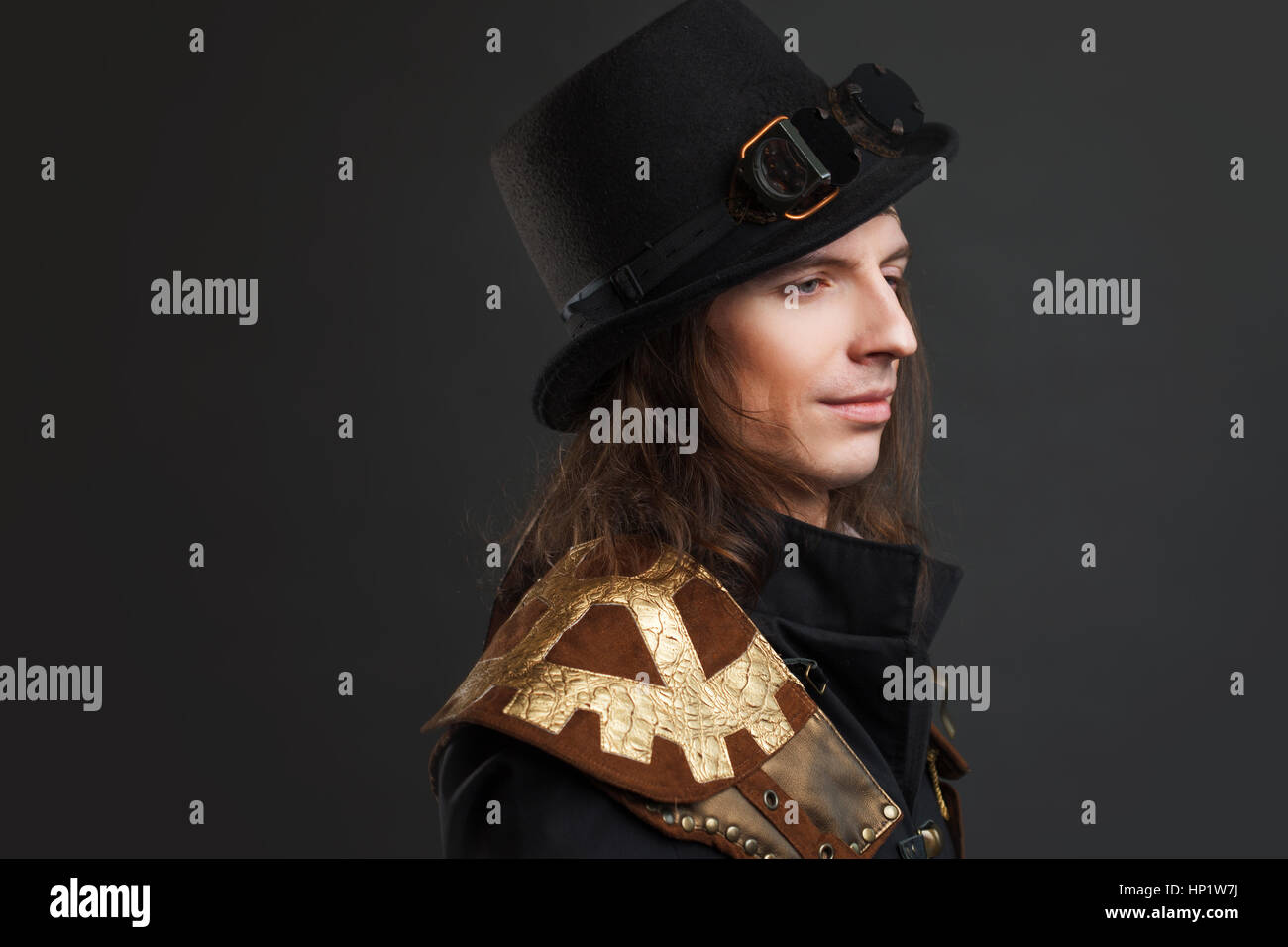 Handsome male Steam punk. Retro man portrait over grunge background ...