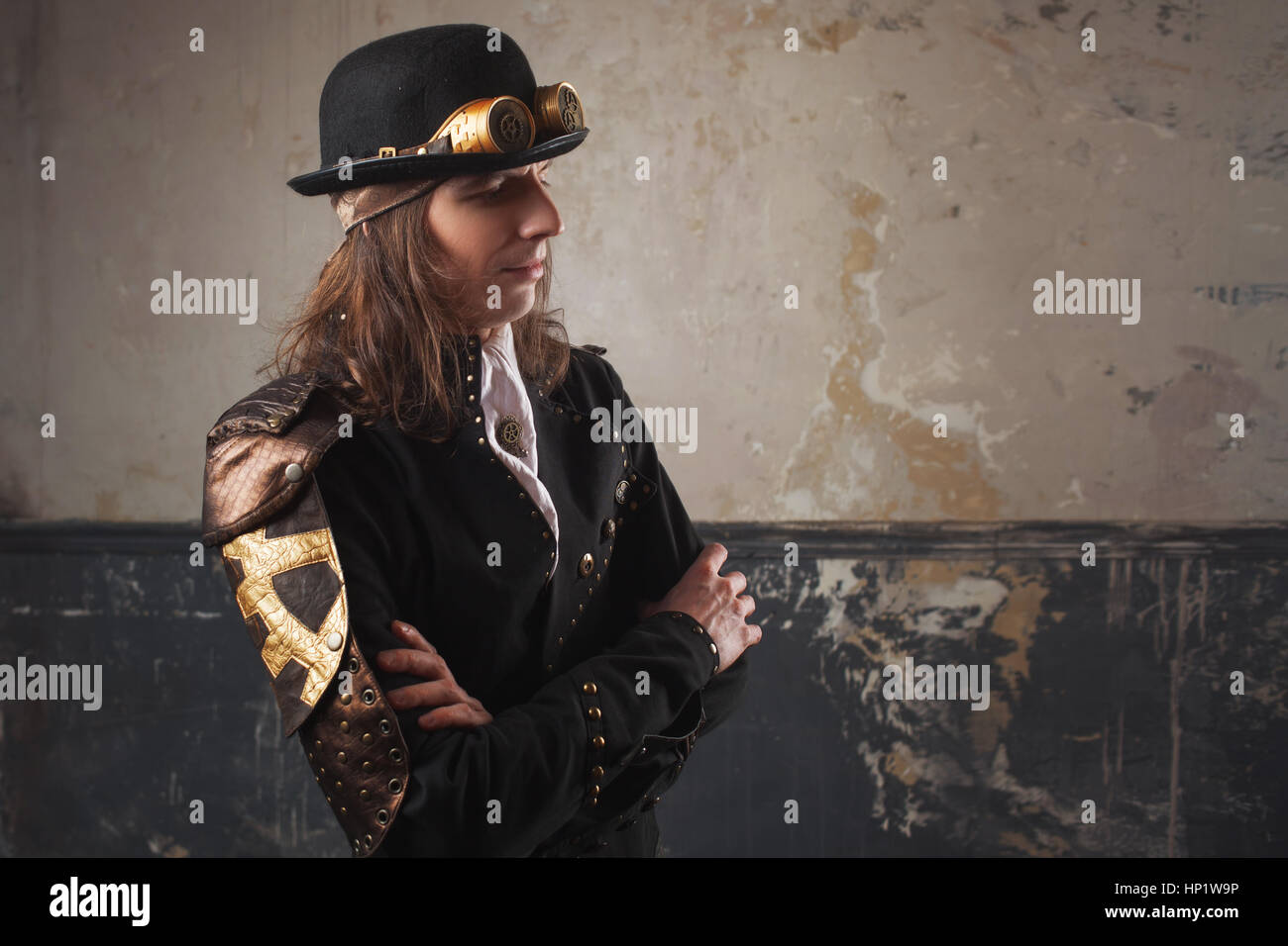 Handsome male Steam punk. Retro man portrait over grunge background ...