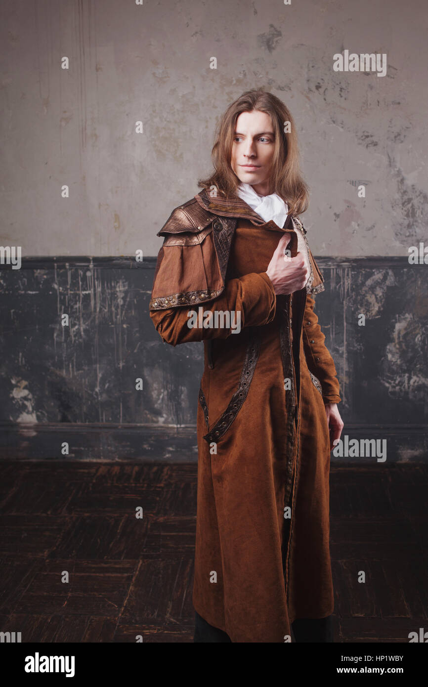 Handsome male Steam punk. Retro man portrait over grunge background ...