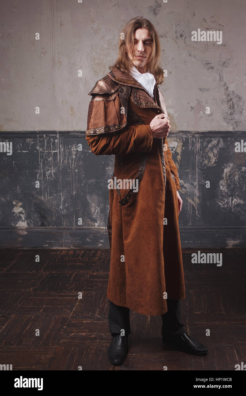 Handsome male Steam punk. Retro man portrait over grunge background ...