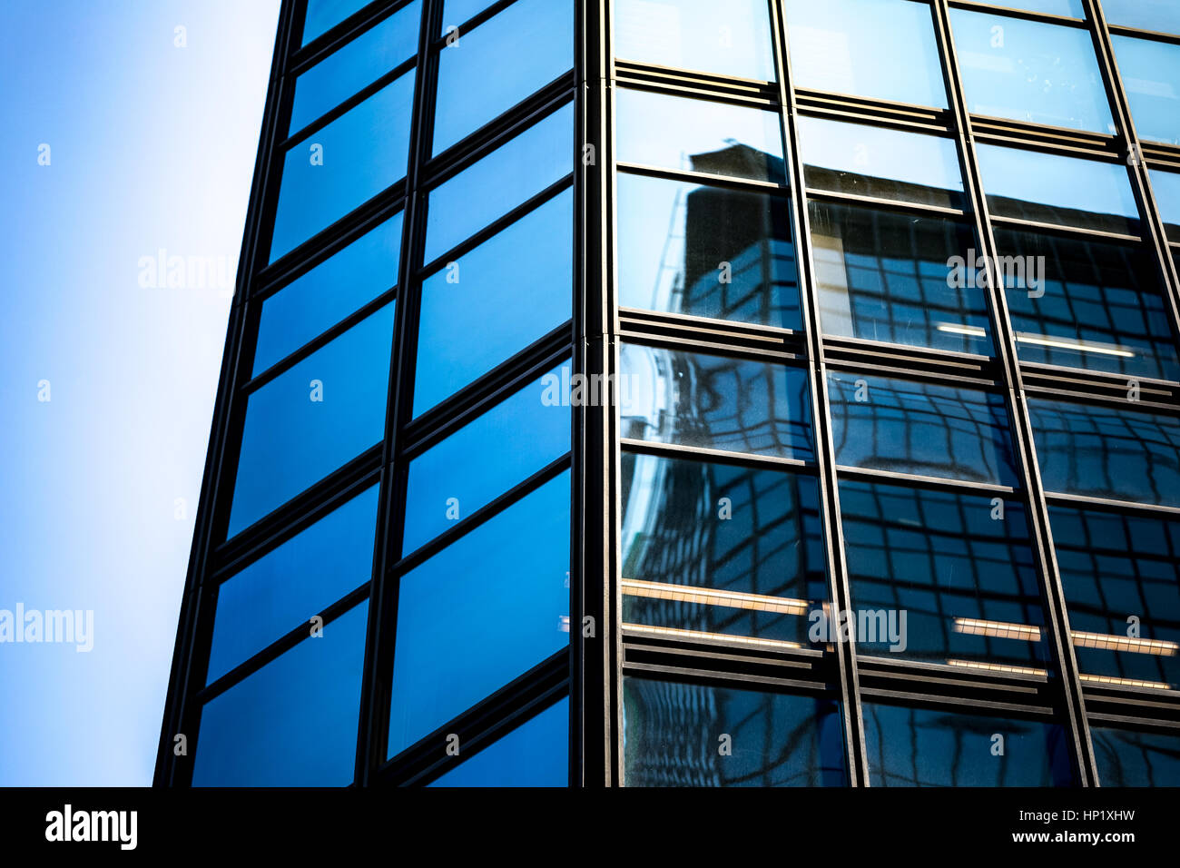 Windows of commercial building in Hong Kong Stock Photo - Alamy