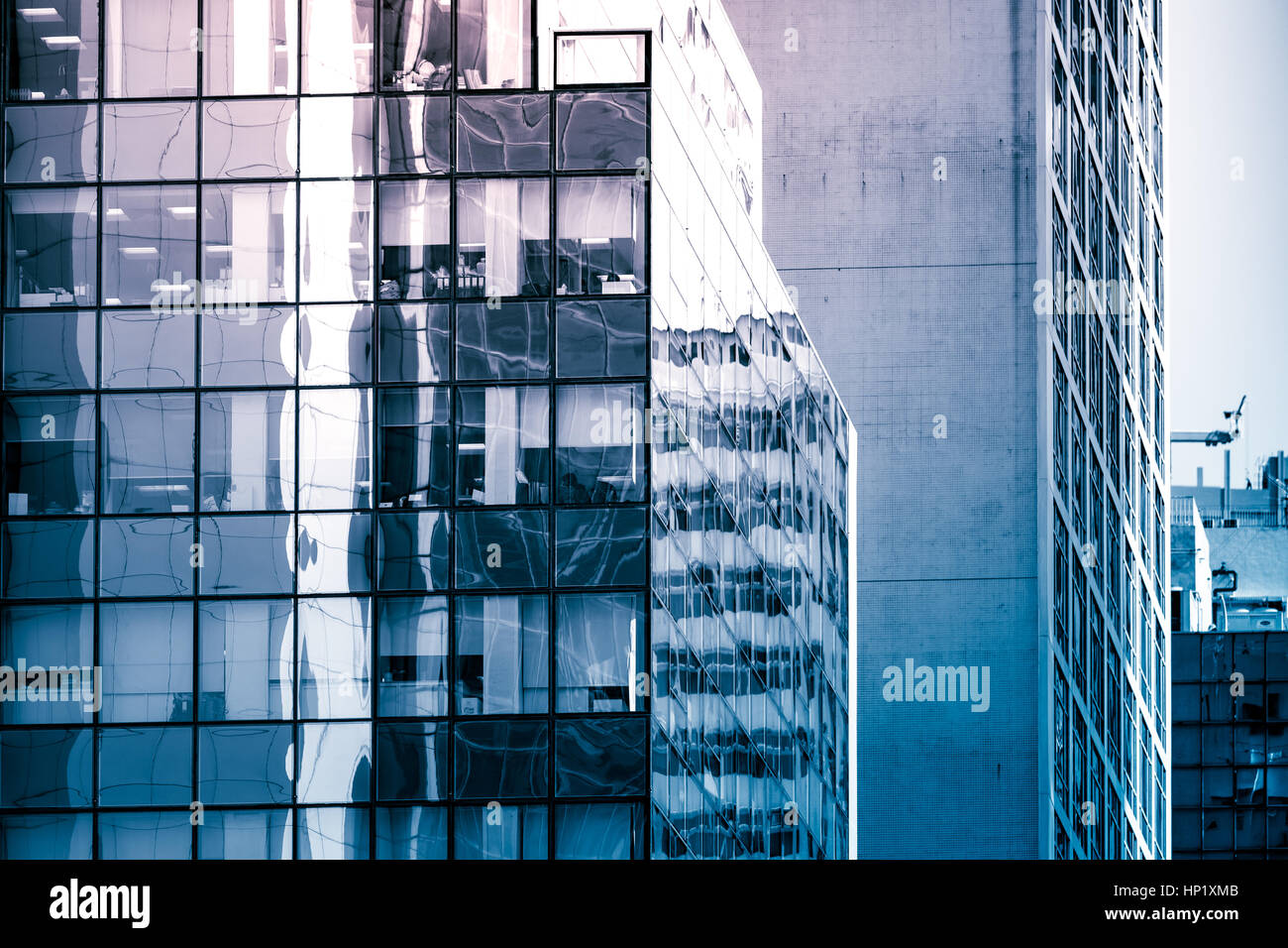 Windows of commercial building in Hong Kong Stock Photo - Alamy
