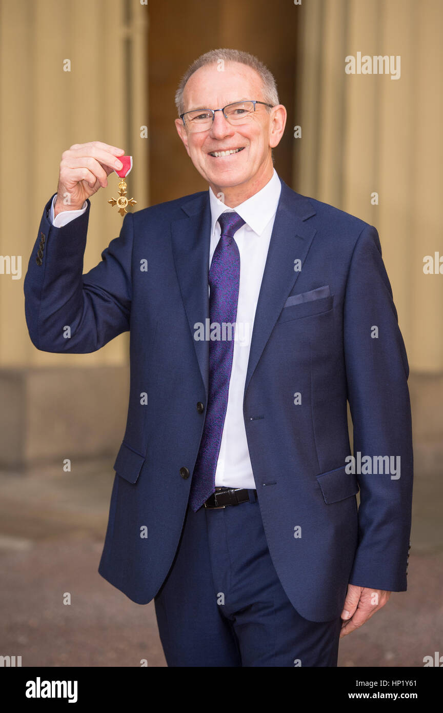 Peter Rowley at Buckingham Palace, London, after receiving his OBE ...