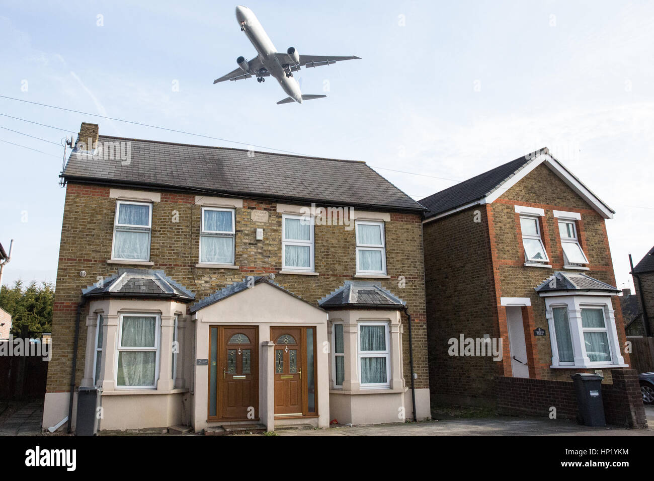 London, UK. An aircraft flies over a house in Hatton Cross on the ...