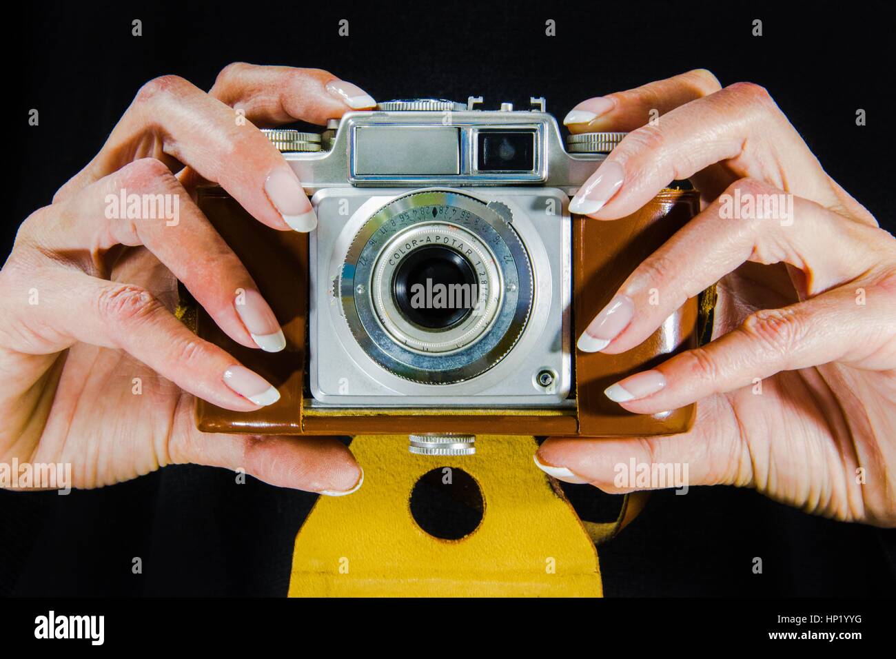 Female hand holding camera hi-res stock photography and images - Alamy