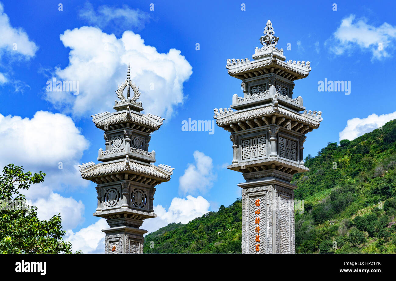 Part of architectural gate of a Buddhist temple in Vietnam. two columns ...