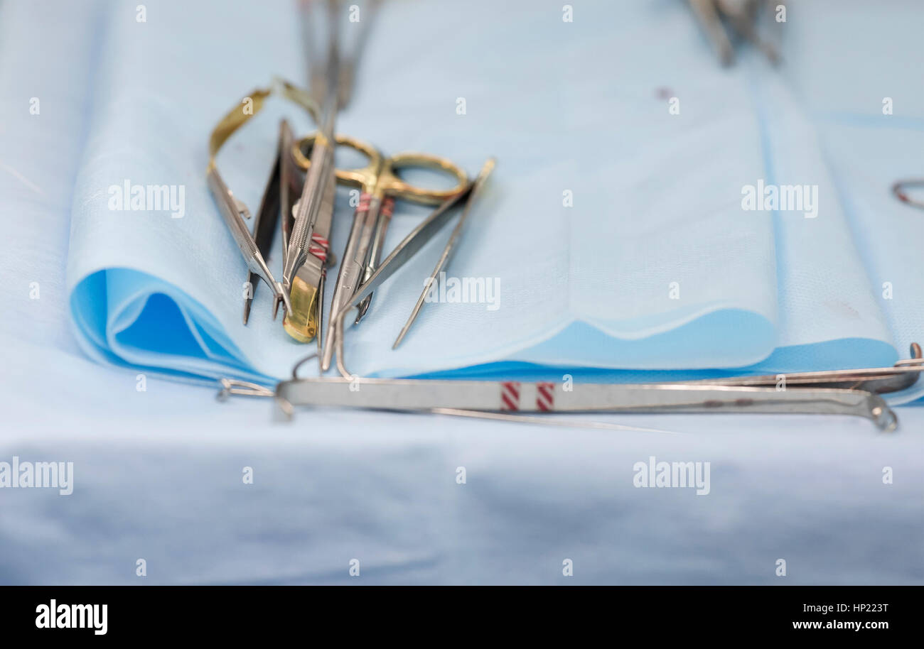sterile surgical instruments on during the operation table Stock Photo ...
