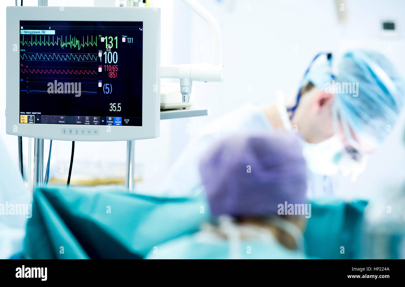 heart monitor during surgery with indications of vital body functions ...