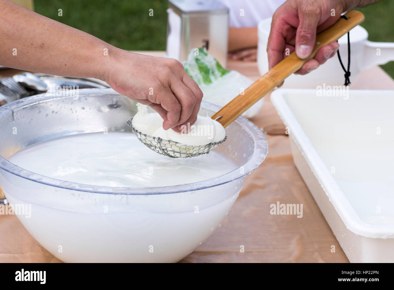 processing of mozzarella in the traditional way Stock Photo - Alamy