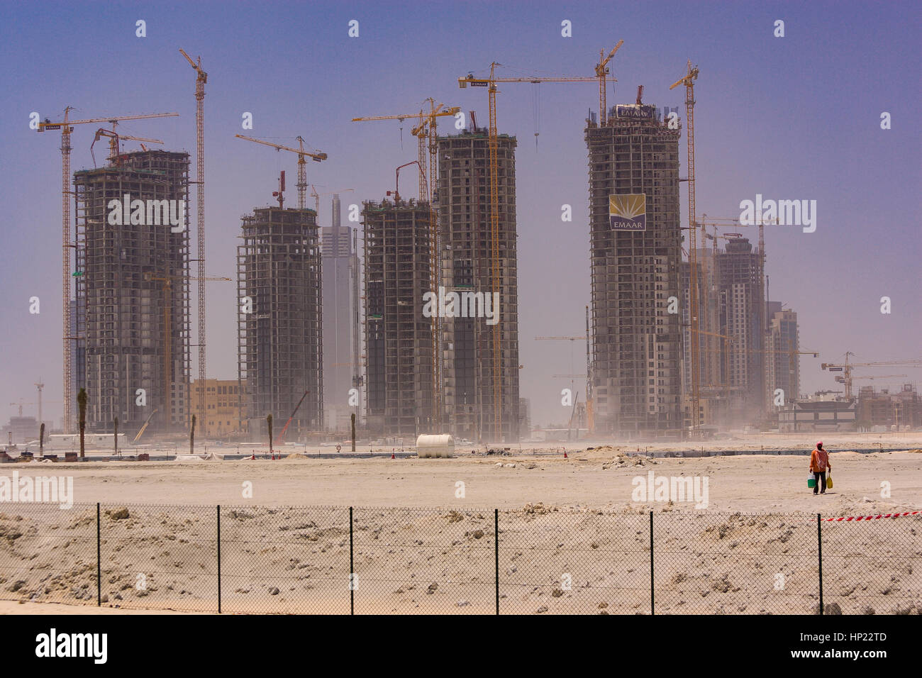 DUBAI, UNITED ARAB EMIRATES - New buildings under construction and arid ...