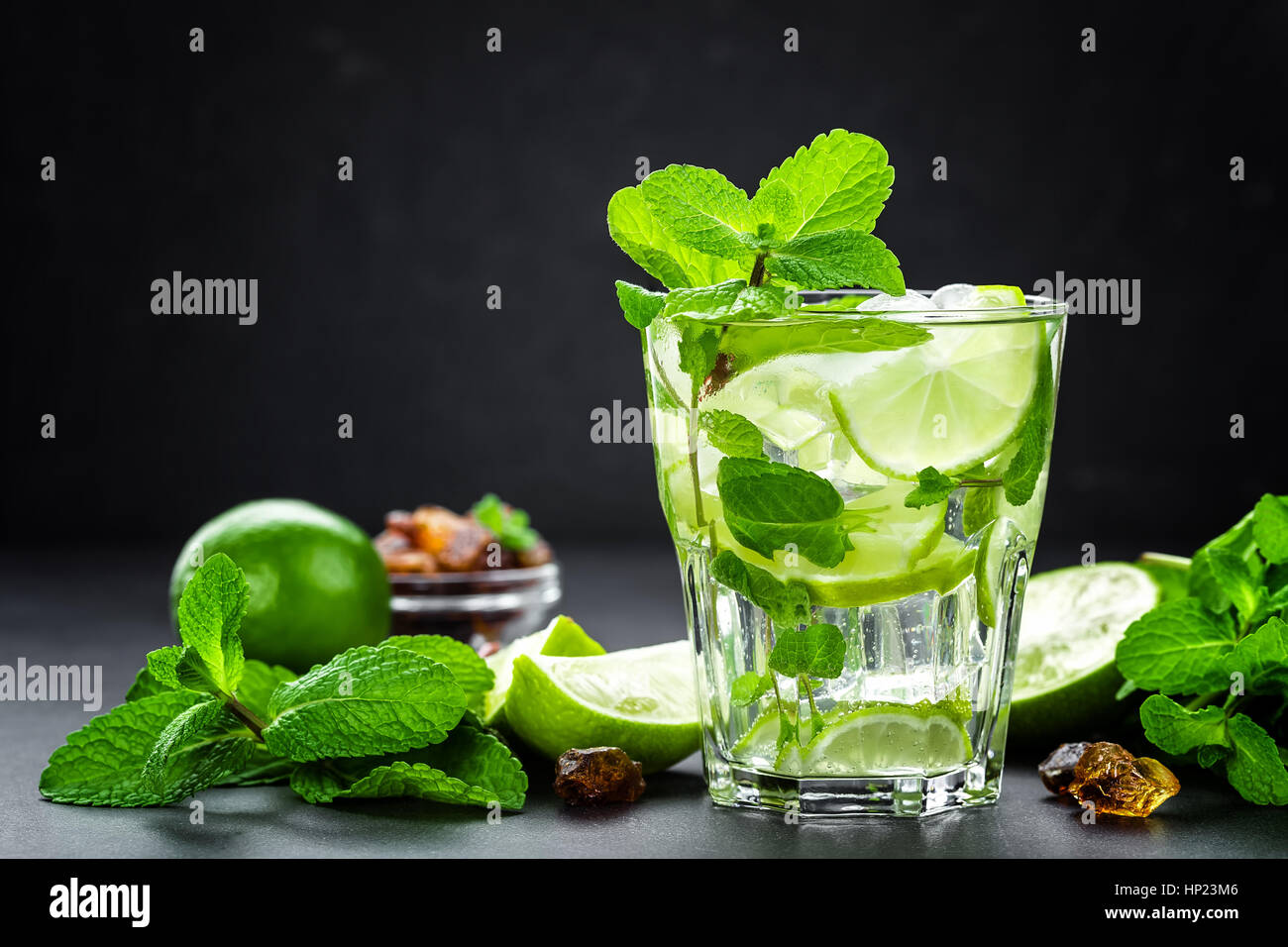 Mojito Cubano or caipirinha cocktail, iced drink with lime and mint ...