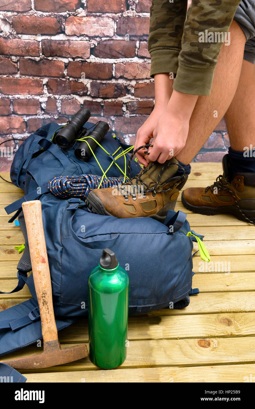 Hiking equipment, rucksack, boots and backpack. Concept for family ...