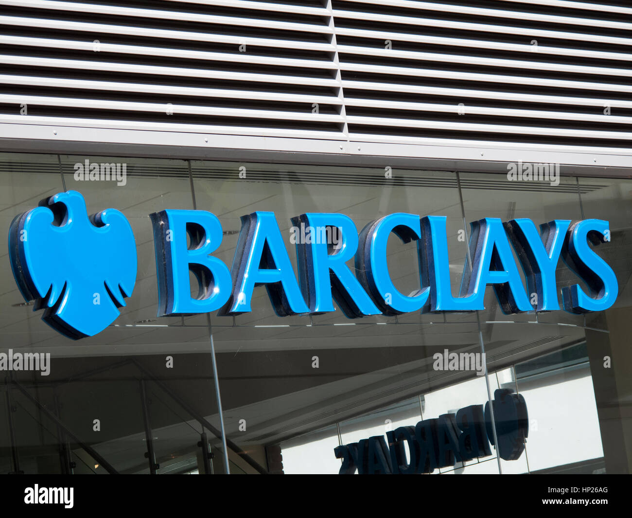 Bank name and sign over local branch office located Stock Photo - Alamy