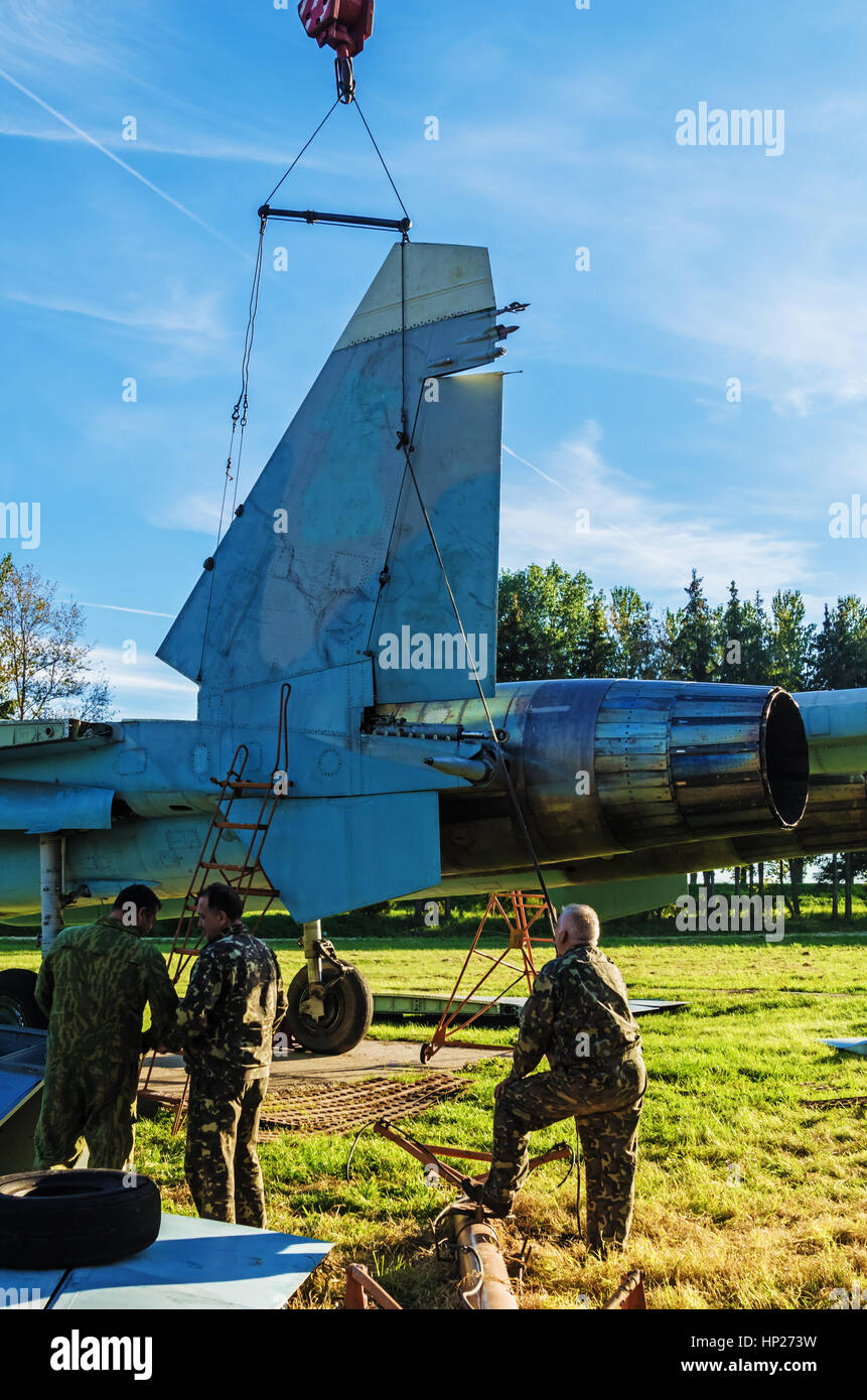 The jet fighter SU-27 is set by a monument in the territory of the ...