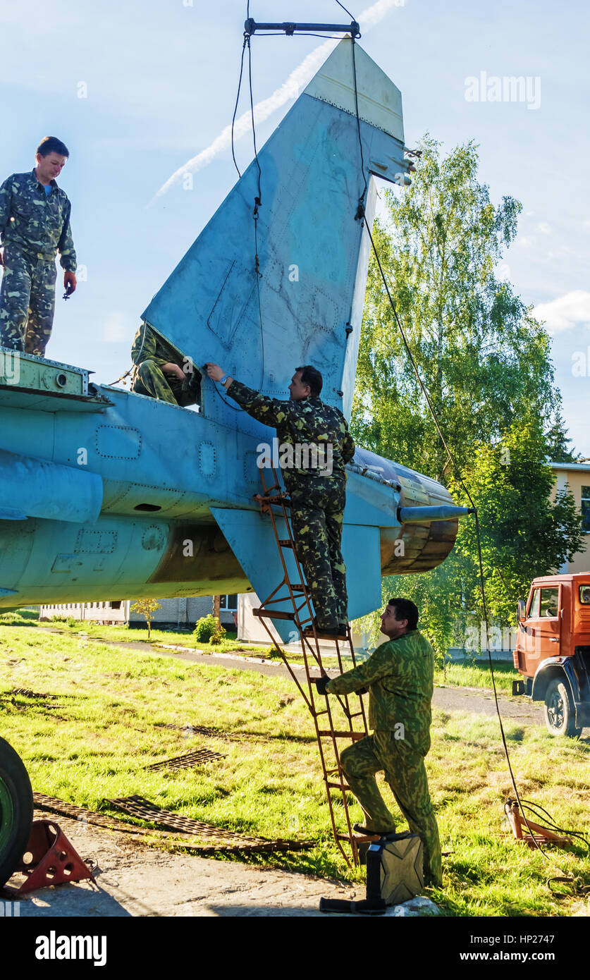 The jet fighter SU-27 is set by a monument in the territory of the ...