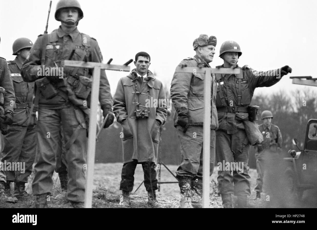 General Garrison H. Davidson with soft hat, and journalist Sam Castan ...