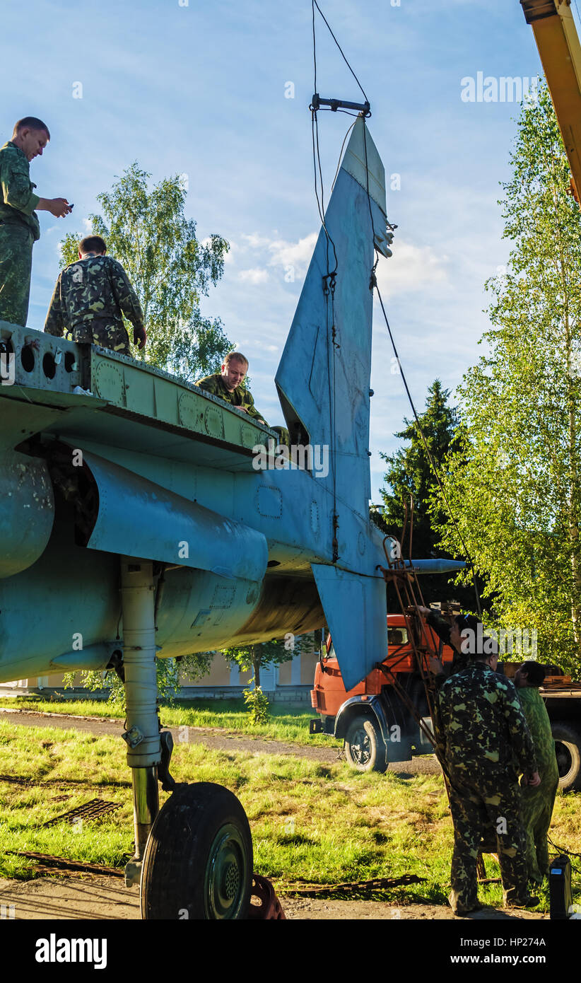 The jet fighter SU-27 is set by a monument in the territory of the ...