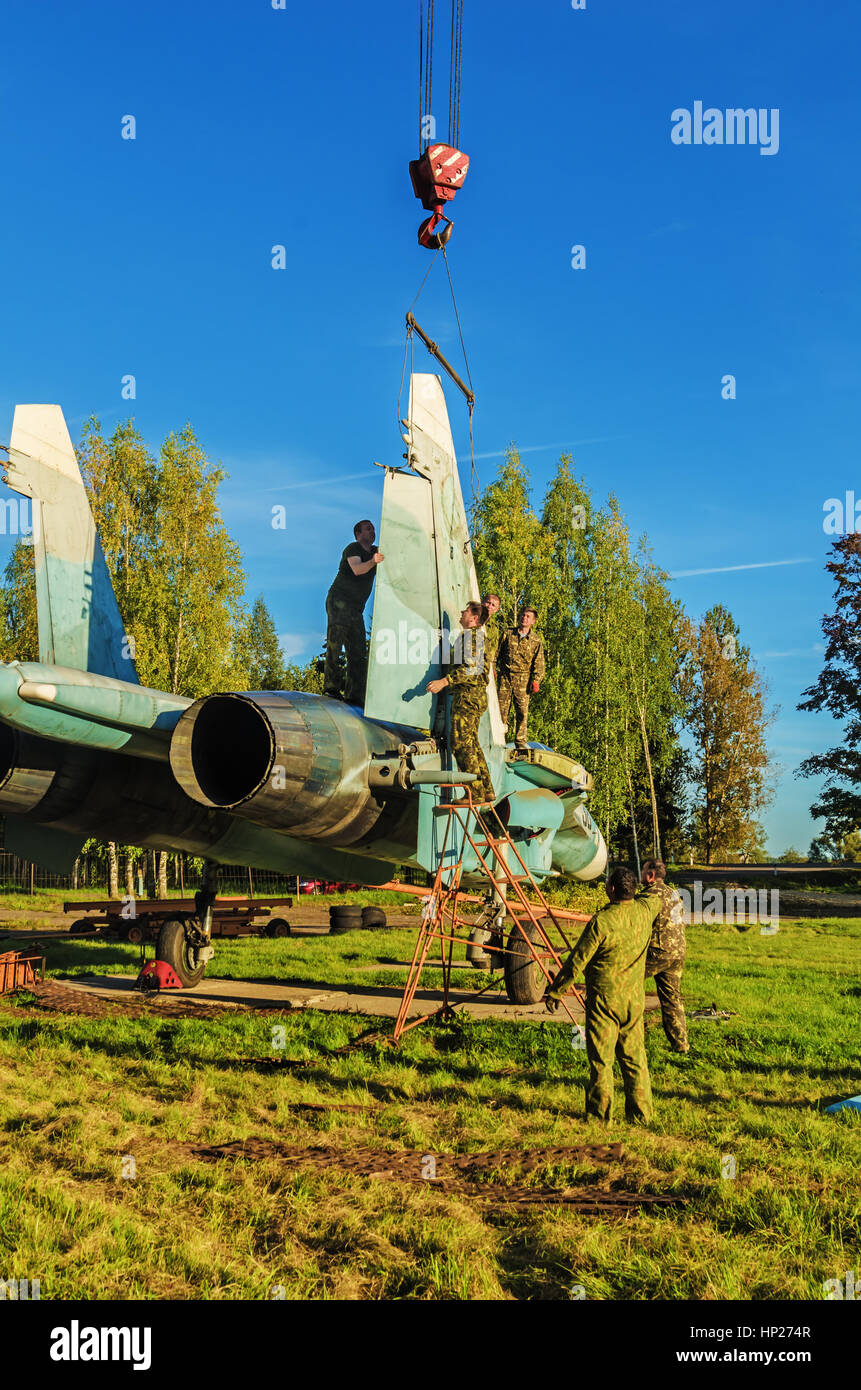 The jet fighter SU-27 is set by a monument in the territory of the ...