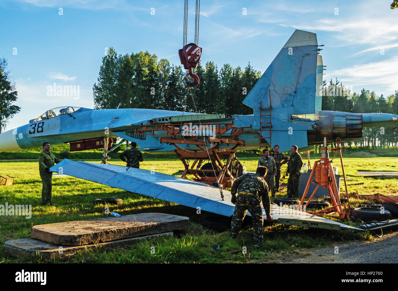The jet fighter SU-27 is set by a monument in the territory of the ...