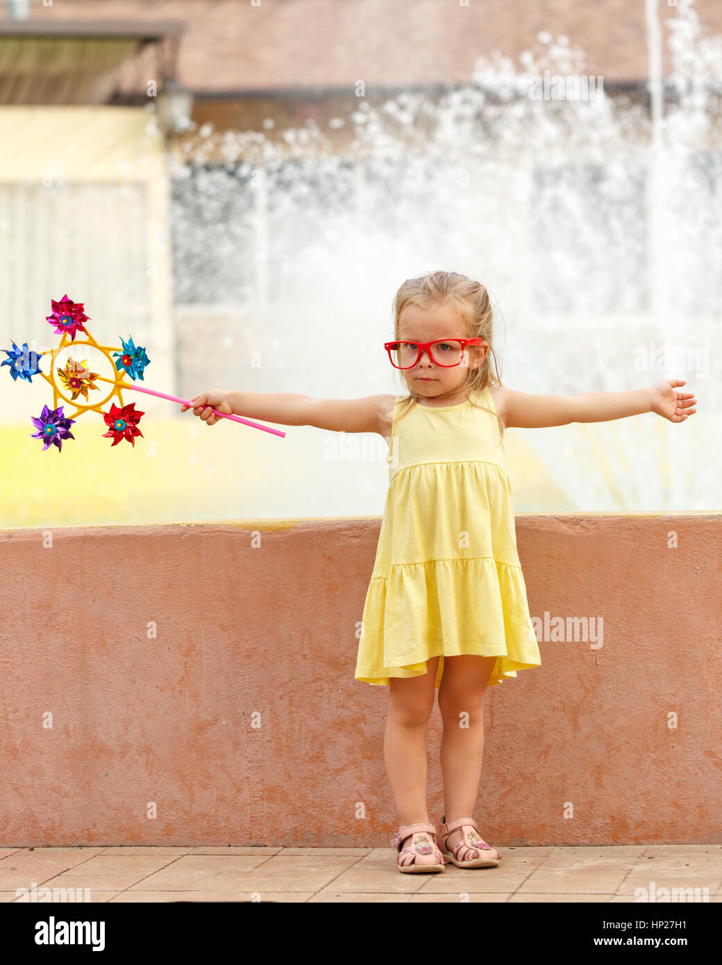 Girl With A Pinwheel High Resolution Stock Photography and Images - Alamy