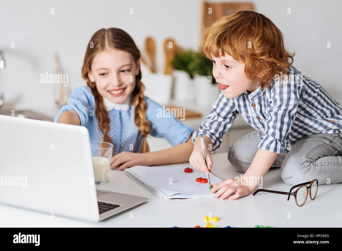 Intelligent girl explaining math using vivid examples Stock Photo - Alamy