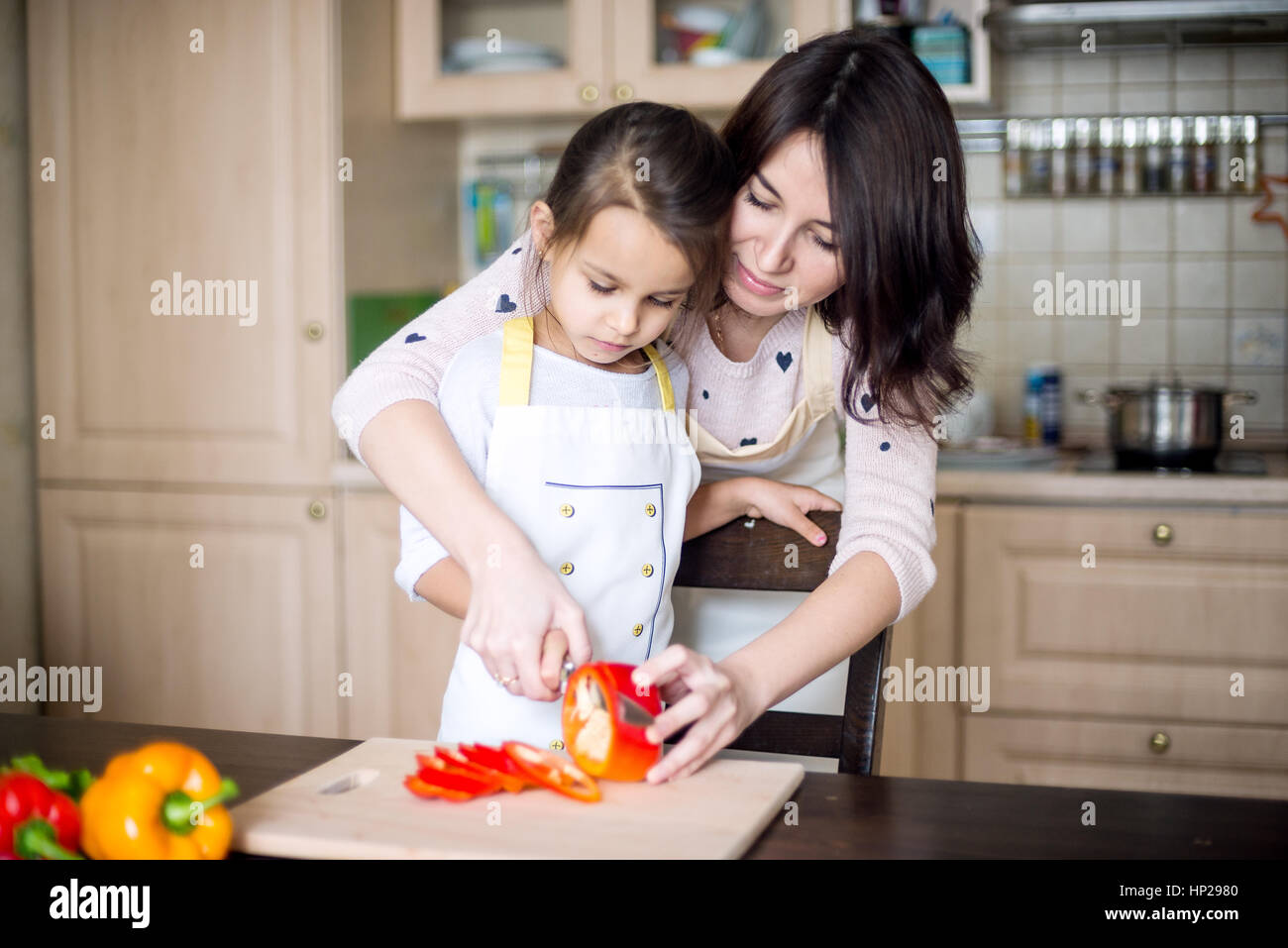 Mother and daughter cooking Stock Photo - Alamy