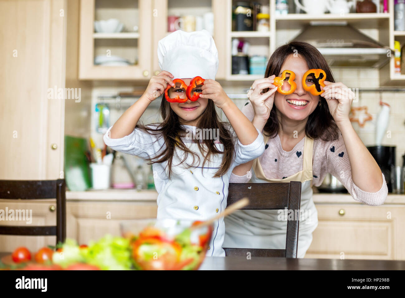 Mother and daughter cooking Stock Photo - Alamy
