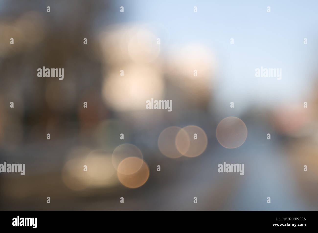 Traffic abstract background with blurry buildings, street signs and ...
