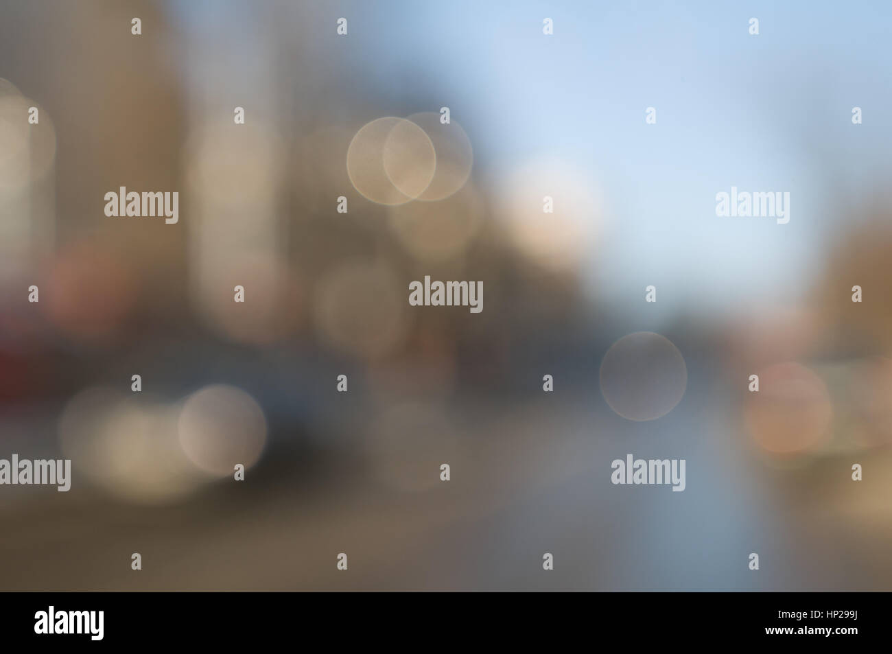 Traffic abstract background with blurry buildings, street signs and ...