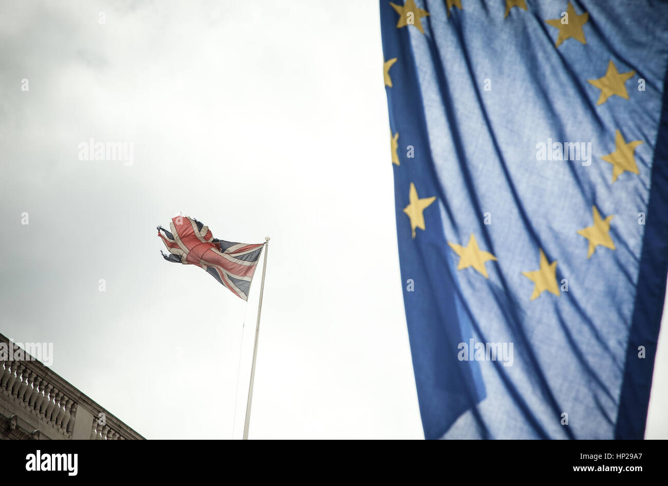 flags of UK and EU combined over icons of London - Brexit concept Stock ...
