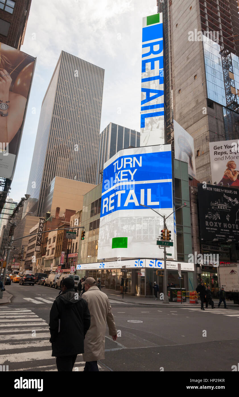 A digital display on Seventh Avenue in Times Square advertises the ...