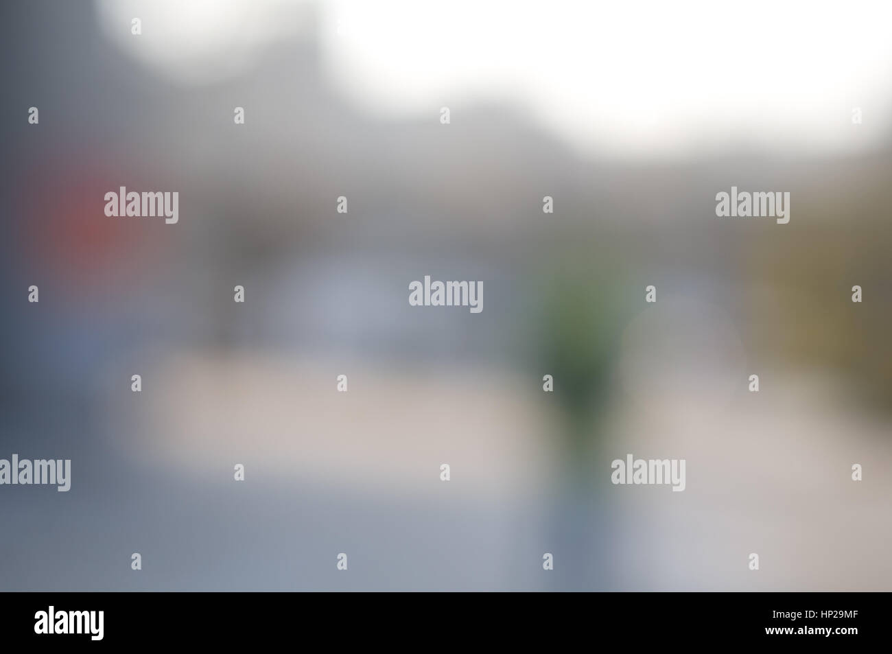 Outdoor abstract background with blurry buildings and people Stock ...